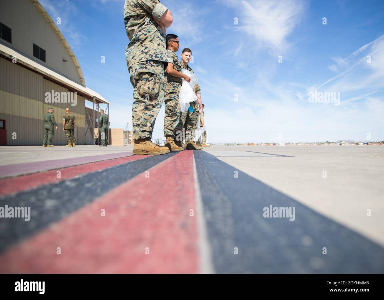 U.S. Marines line up before conducting an Foreign Object Debris (FOD ...