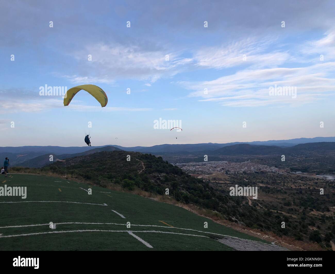 paragliding pilot preparing for flight Stock Photo - Alamy