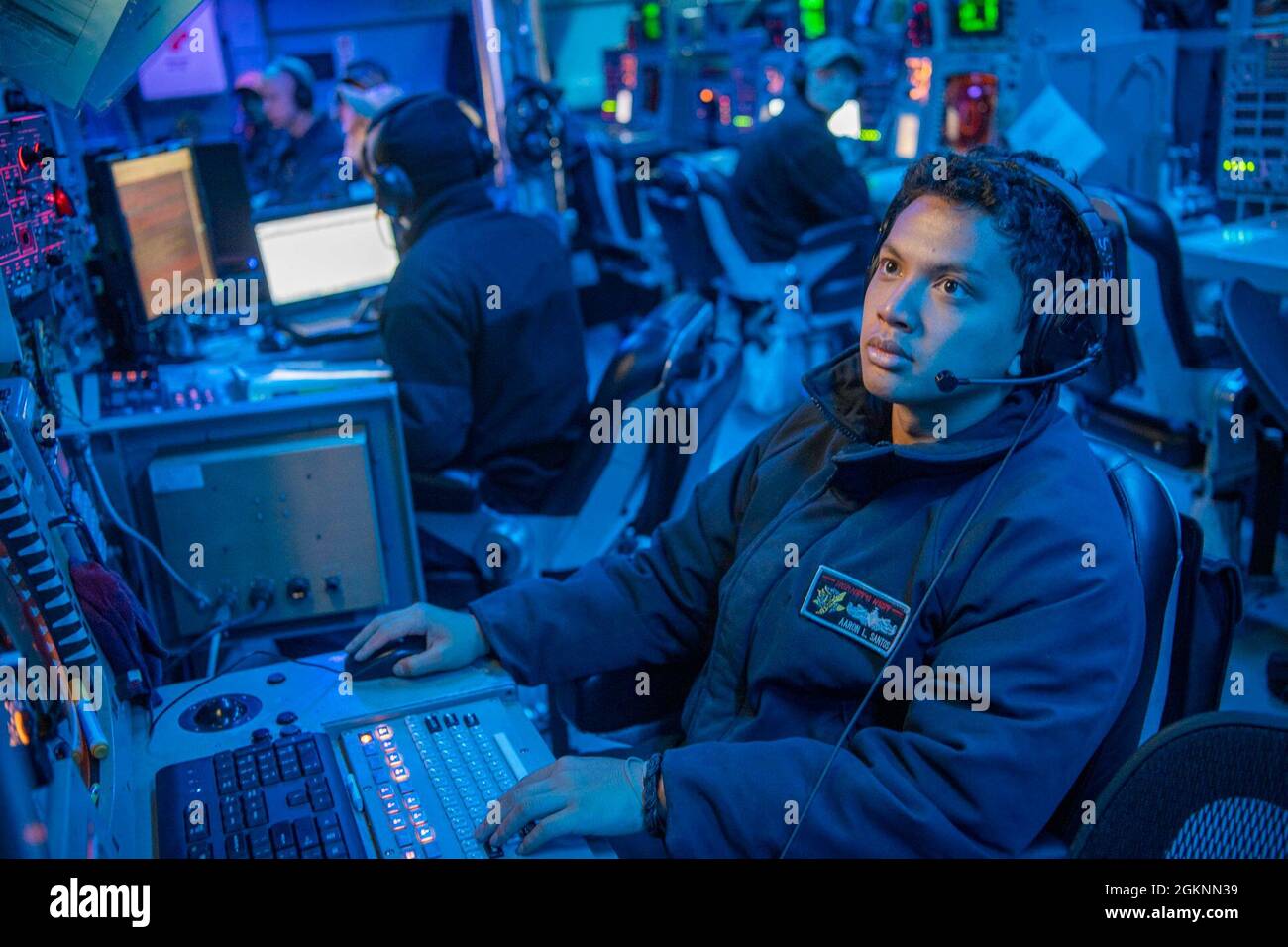 210607-N-JW440-1453 PHILIPPINE SEA (June 7, 2021) Operations Specialist ...