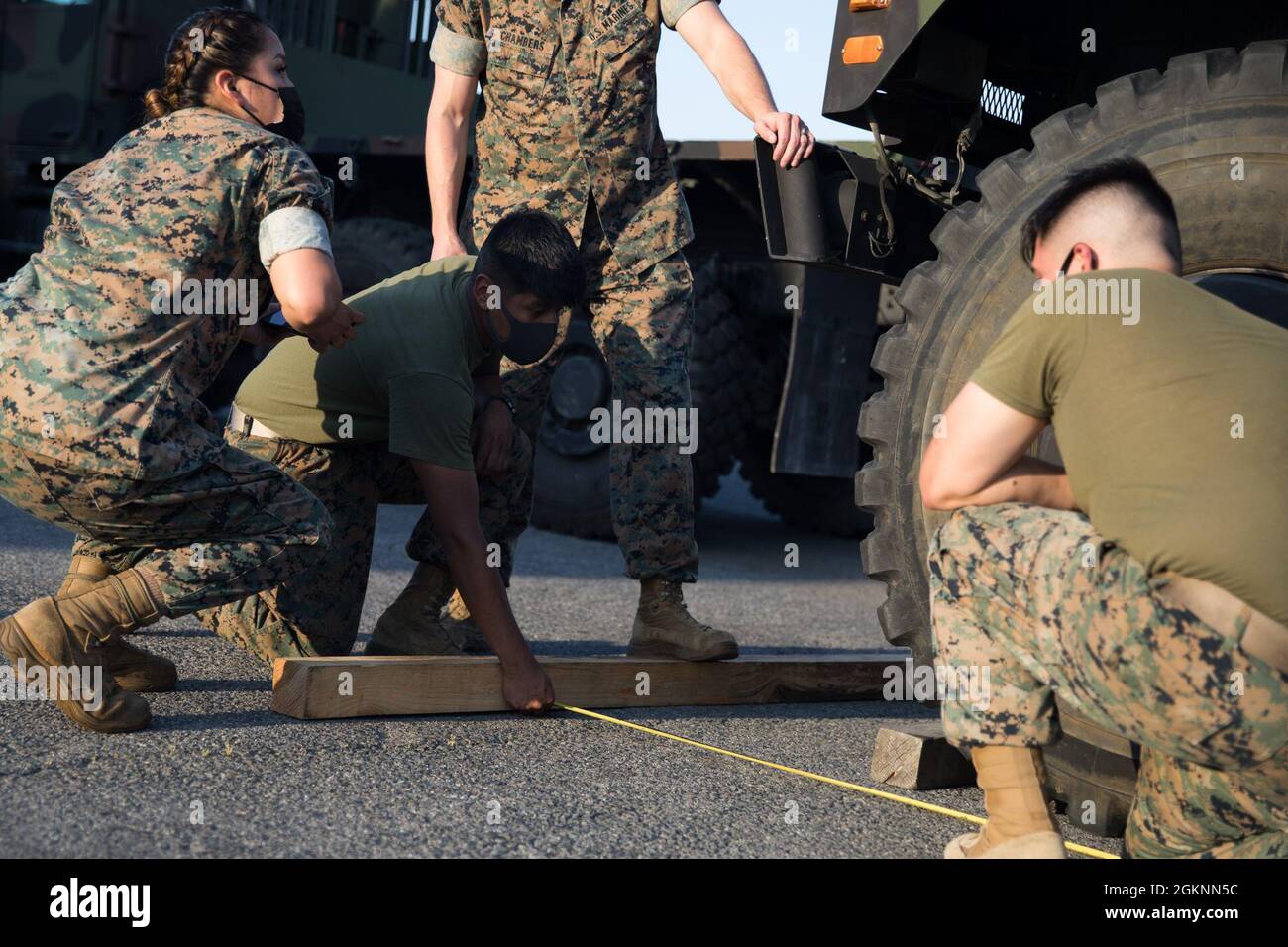 U.S. Marines with Marine Wing Support Squadron 171 mark and measure ...