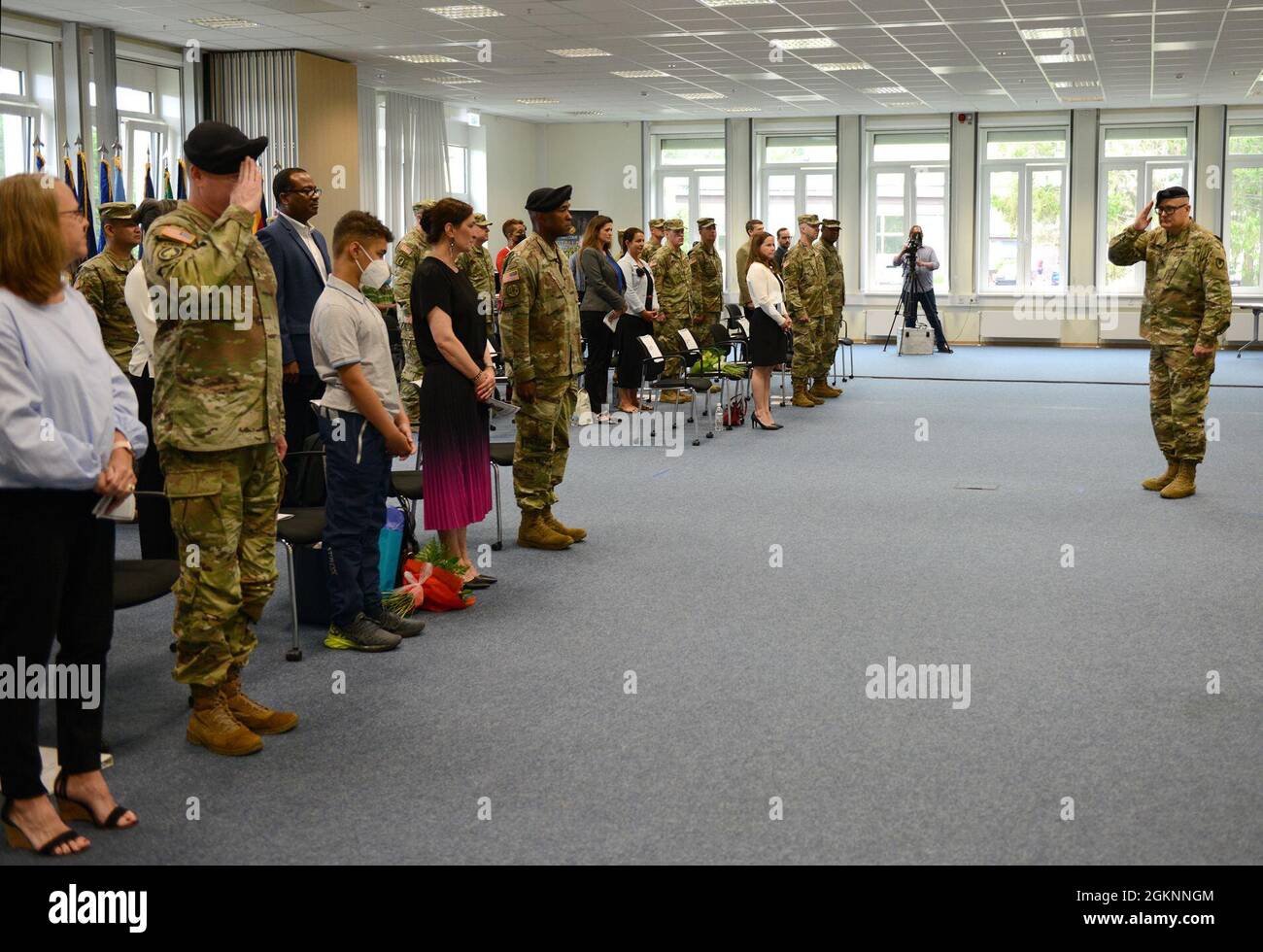 U.S. Army Col. Jarrett S. Moffitt (right) renders a salute to Maj. Gen ...