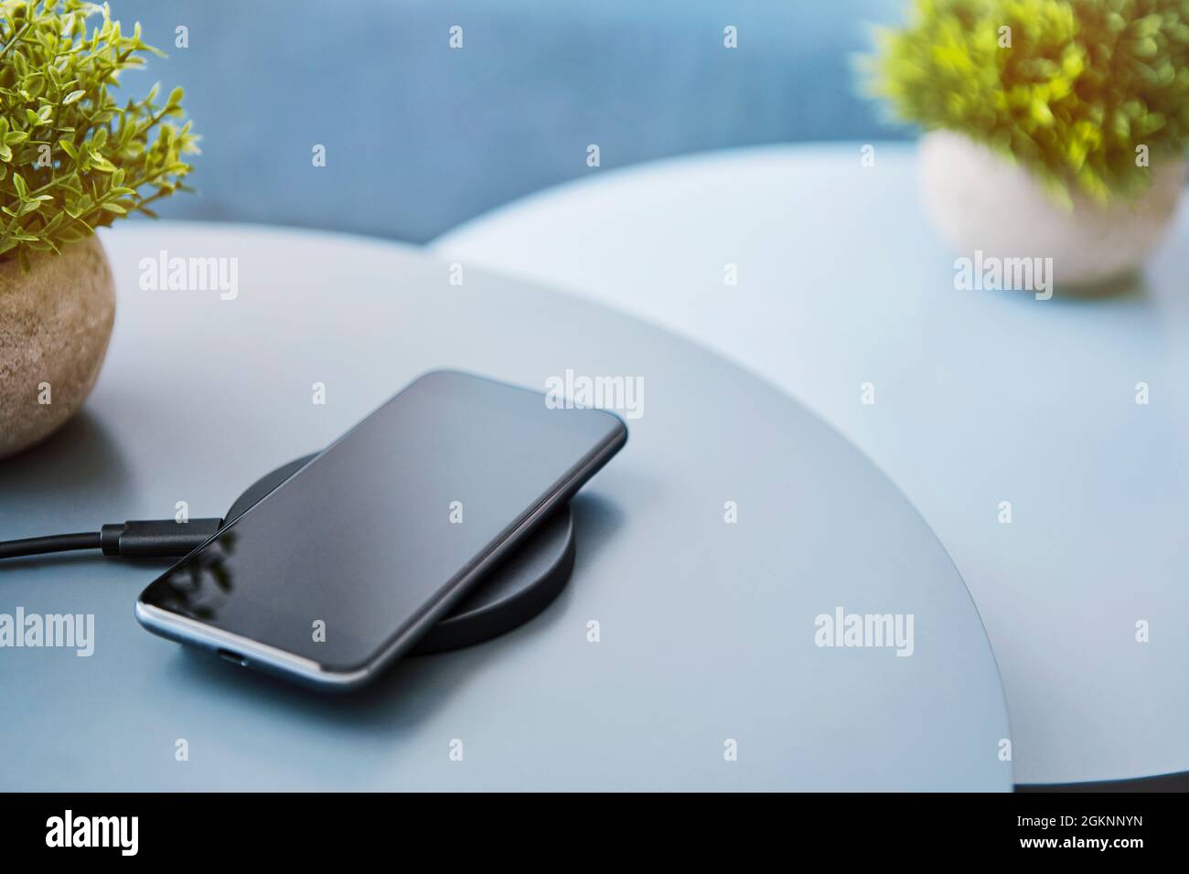 Wireless inductive charging smartphone battery. Electronic ...