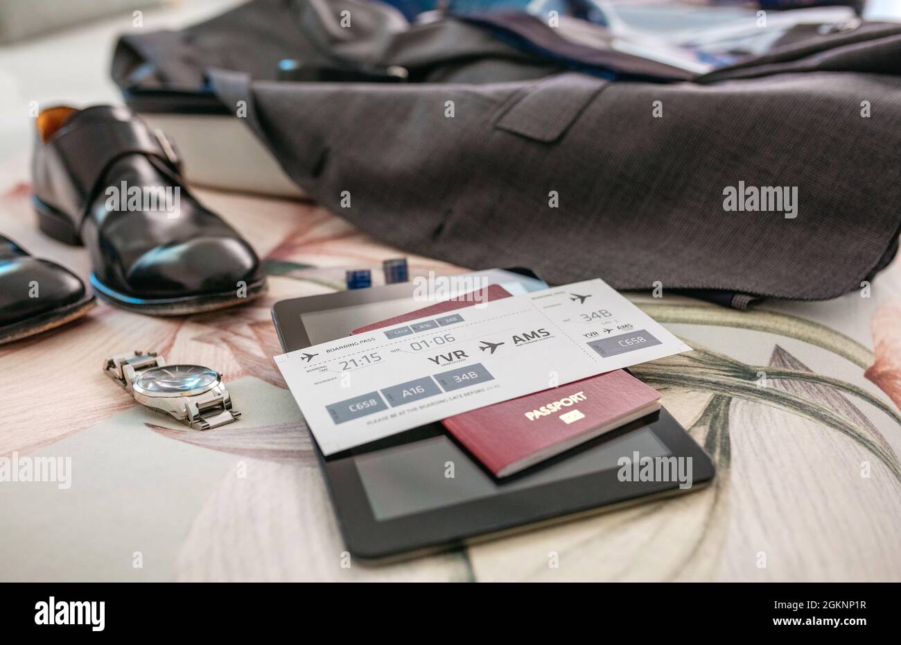 Business travel preparations with boarding pass Stock Photo - Alamy