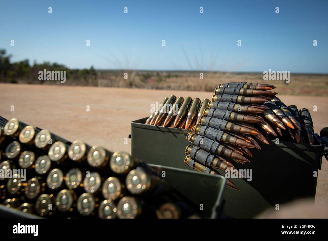 Ammunition for the M2 heavy machine gun is stacked in an ammunition can ...