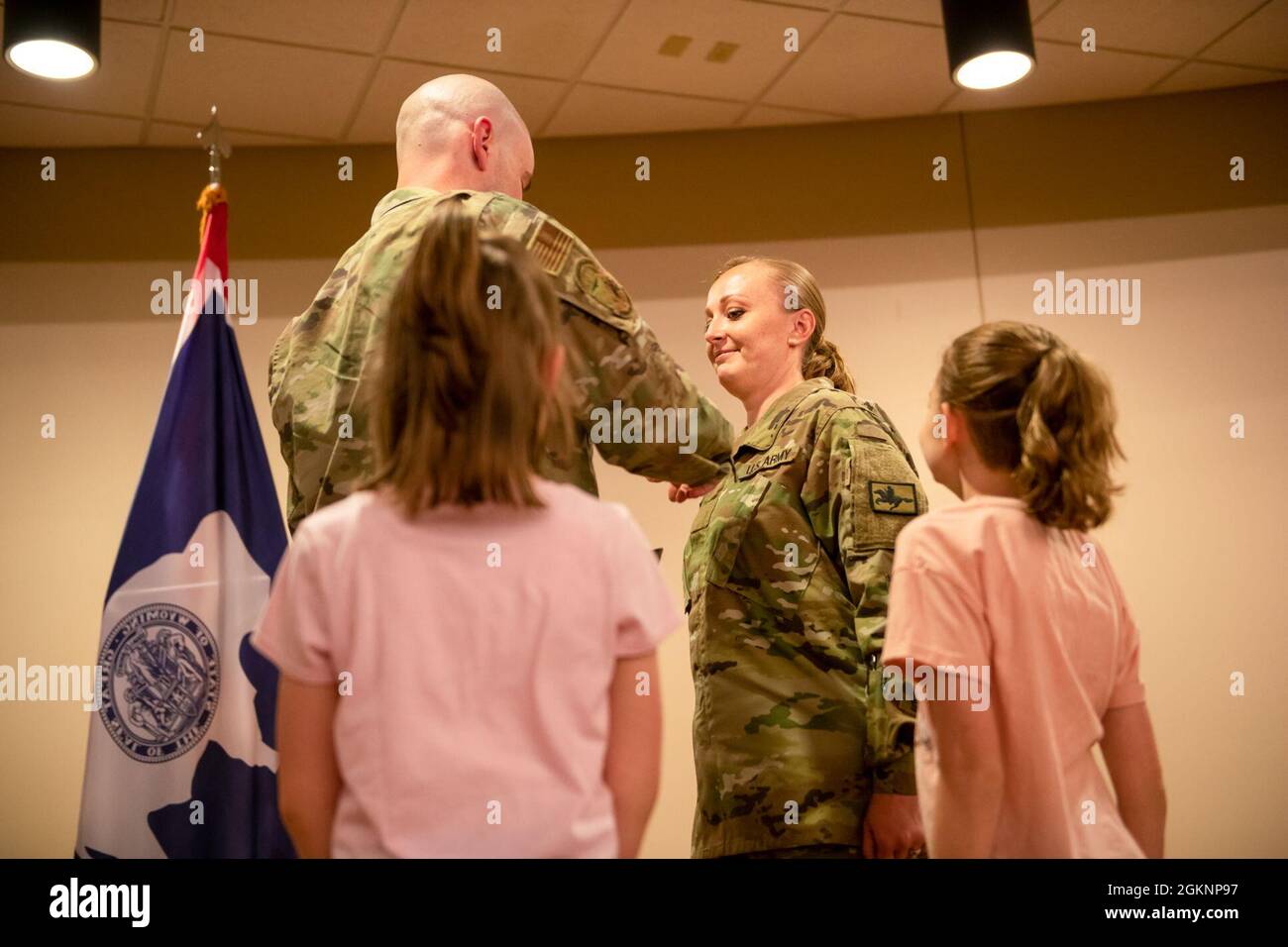 Master Sgt. Adrienne Gibbs’ husband and daughters pin her new rank on ...