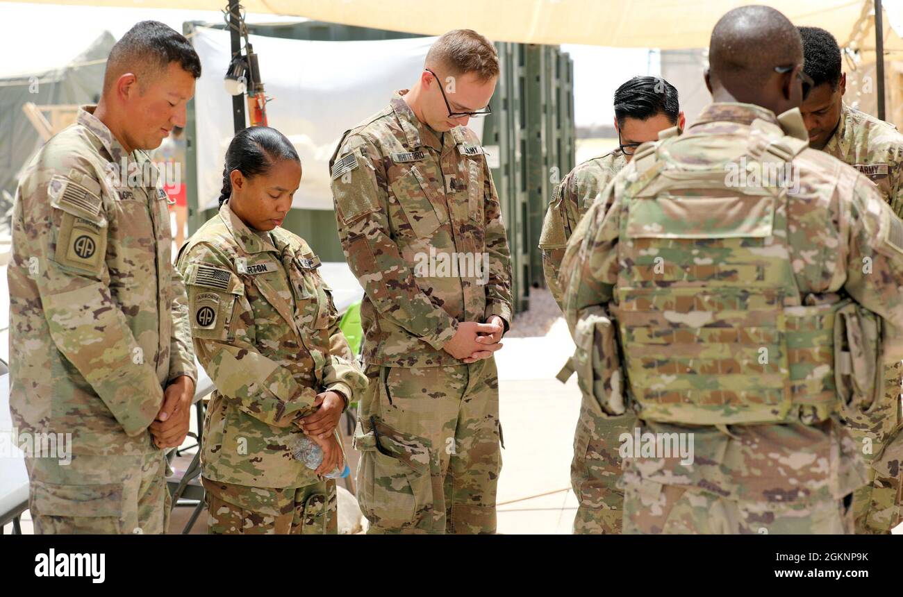 Chaplain (Maj.) David Adelusi with Task Force Phoenix, says a prayer ...
