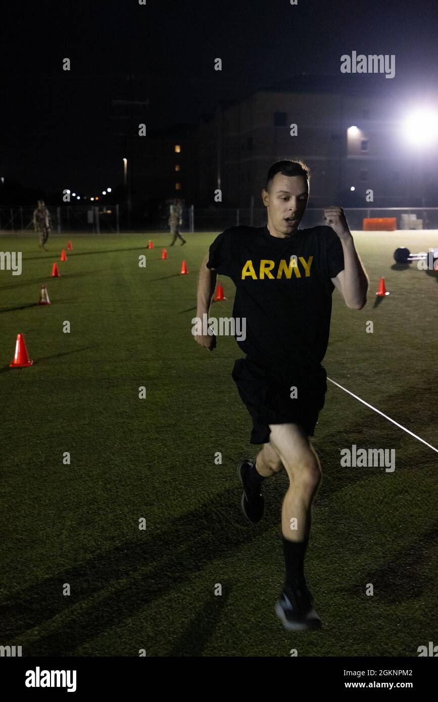U.S. Army Spc. Mitchell Robinson, assigned to U.S. Army North, sprints ...