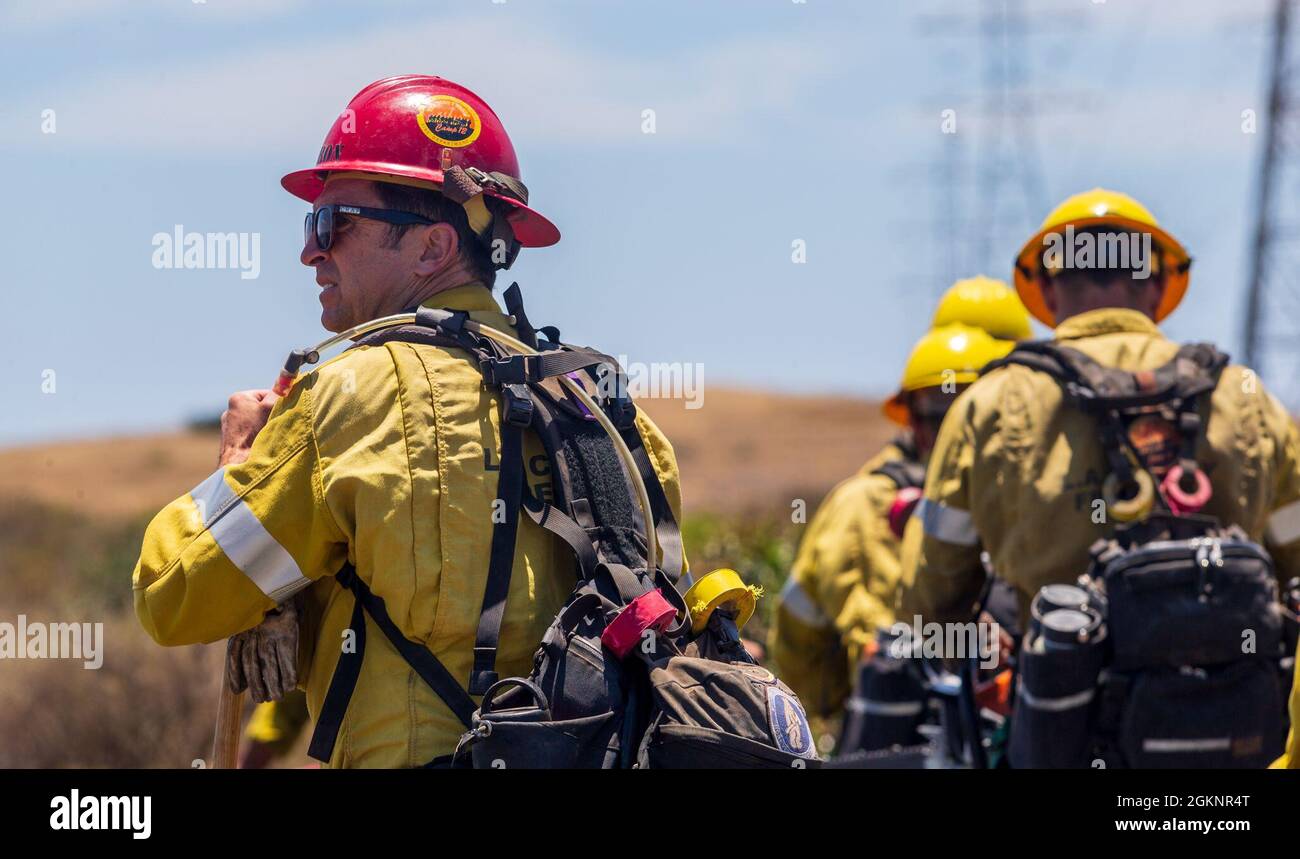 Firefighters with the Los Angeles County Fire Department prepare to ...