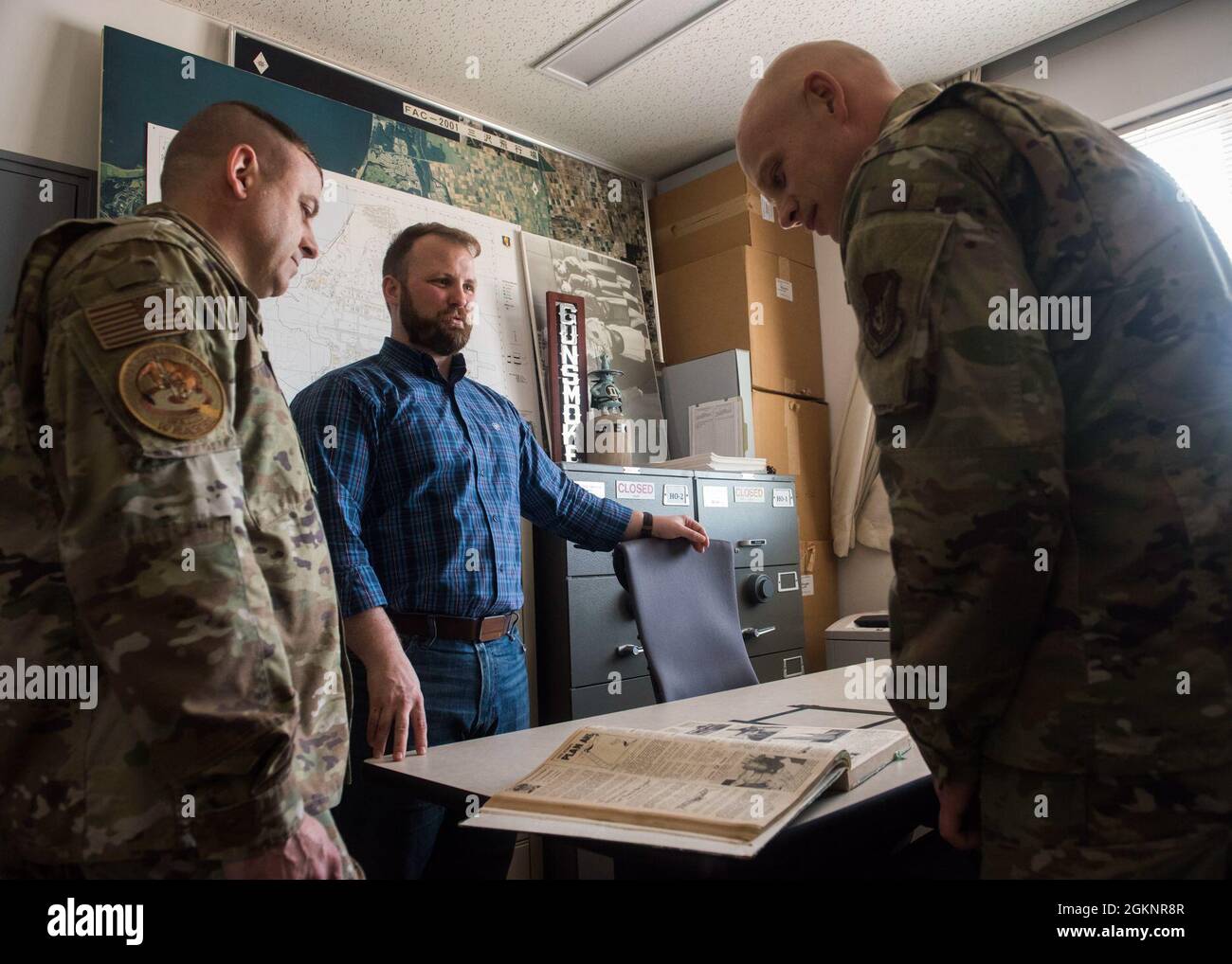 Andrew Nixon, 35th Fighter Wing Historian, middle, shows U.S. Air Force ...