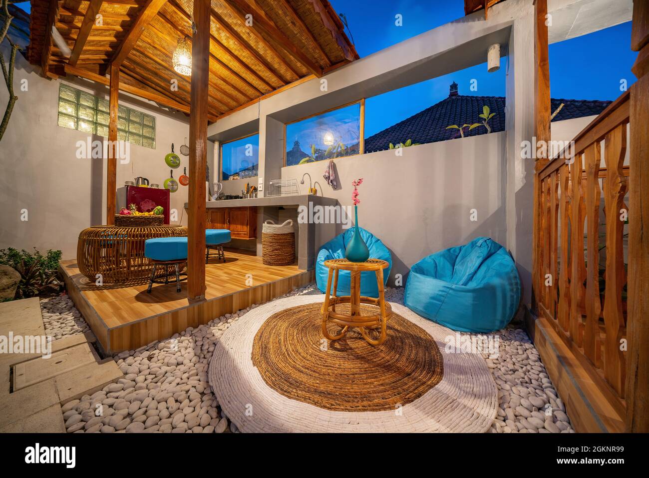 Open loft style kitchen in tropical garden. Evening Stock Photo - Alamy