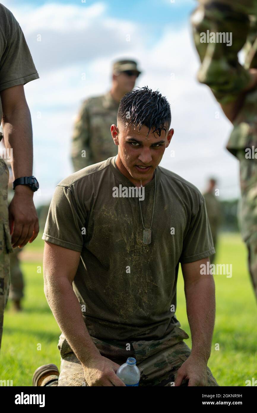 U.S. Army Spc. Justin Earnhart, assigned to U.S. Army South, takes a ...