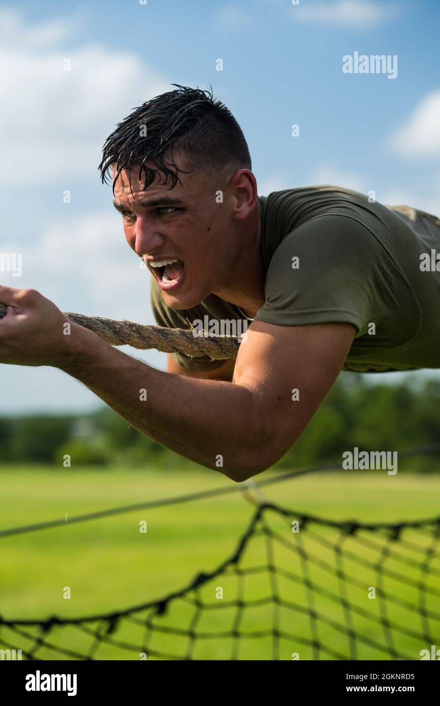 U.S. Army Spc. Justin Earnhart, assigned to U.S. Army South, makes his ...