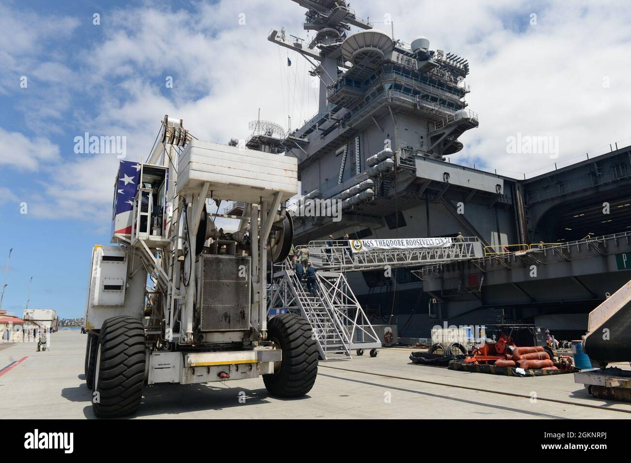 SAN DIEGO (June 8, 2021) – Tilly, an aircraft crash and salvage crane, transits the pier beside ...