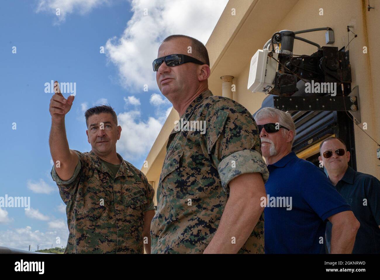 Lt. Col. Tate Buntz, the Marine Corps Base (MCB) Camp Blaz Operations Officer, briefs personnel ...