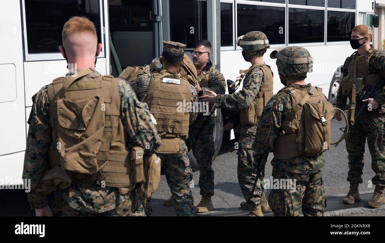 U.S. Marines with Marine Wing Support Squadron 171 are weighed during ...
