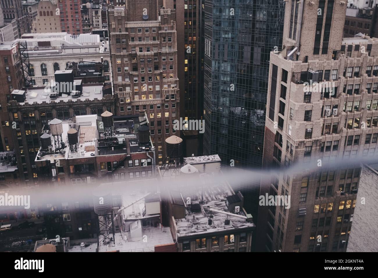View of New York during daylight, seen from a tall building's window ...