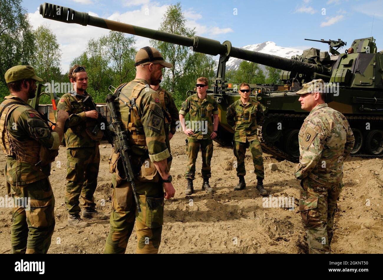 Col. Daniel Miller, the 41st Field Artillery Brigade commander, met ...