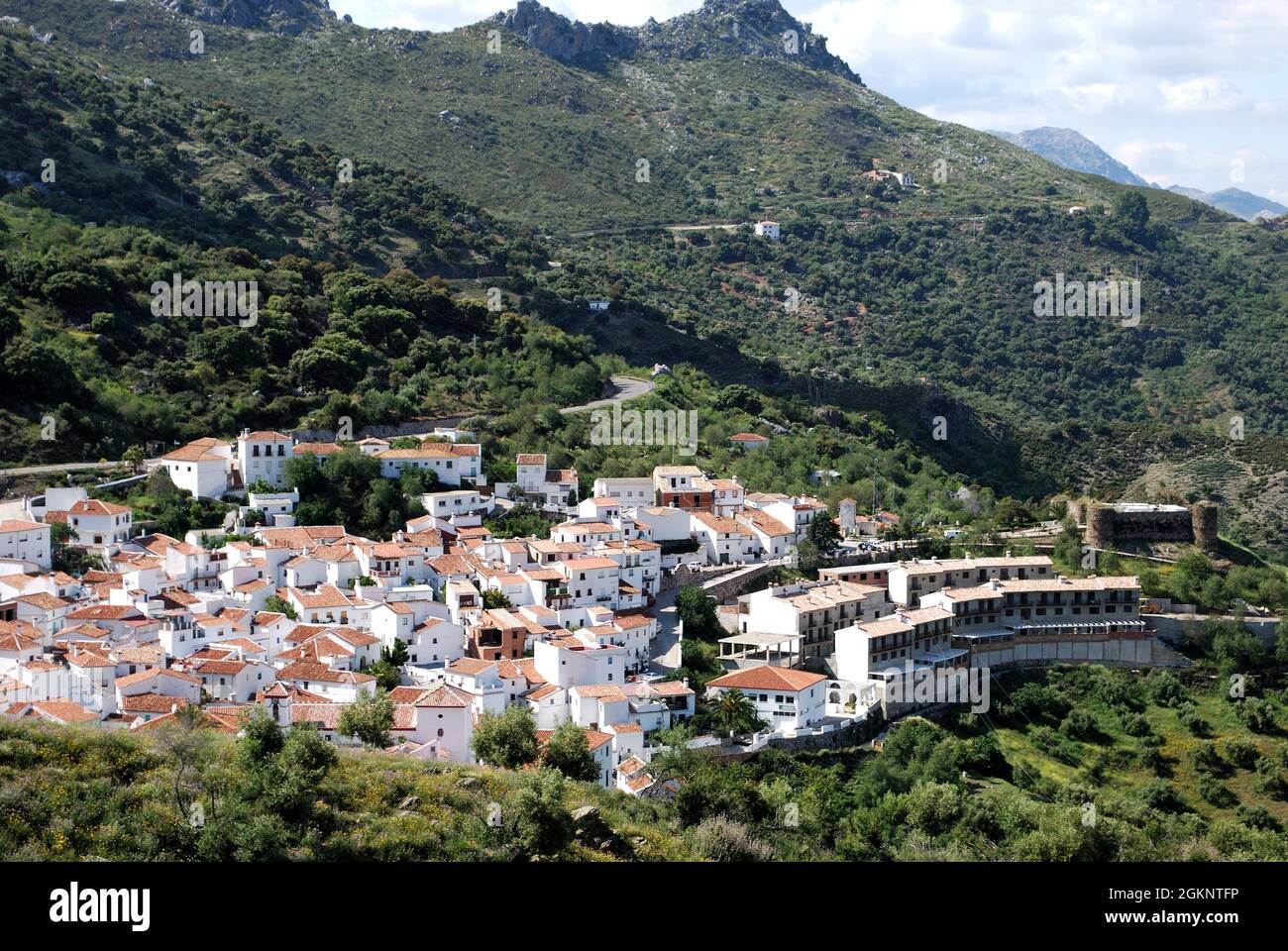 Elevated view of the white town and mountains, Benadalid, Malaga ...