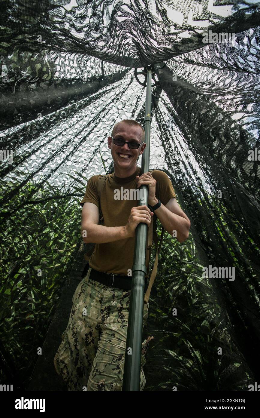 U.S. Navy UT2 Timothy Dowding, utilitiesman with Naval Mobile ...