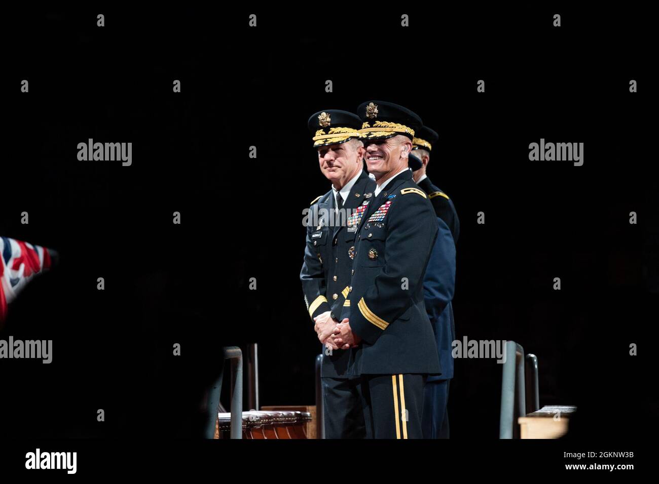 Maj. Gen. Omar J. Jones smiles as gifts are being presented during a ...