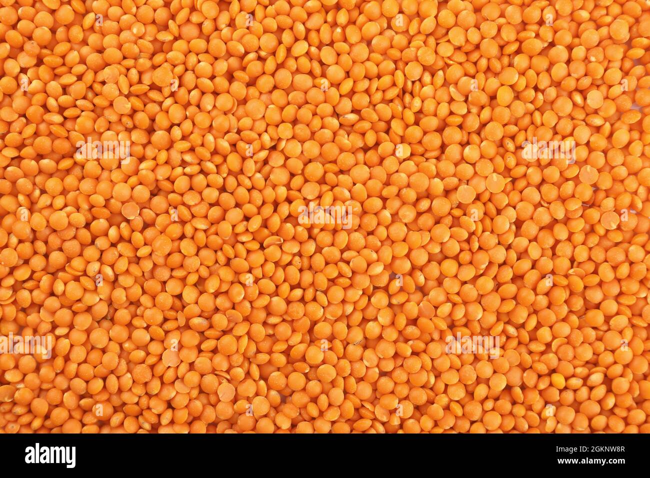 Healthy dry lentils as background Stock Photo - Alamy