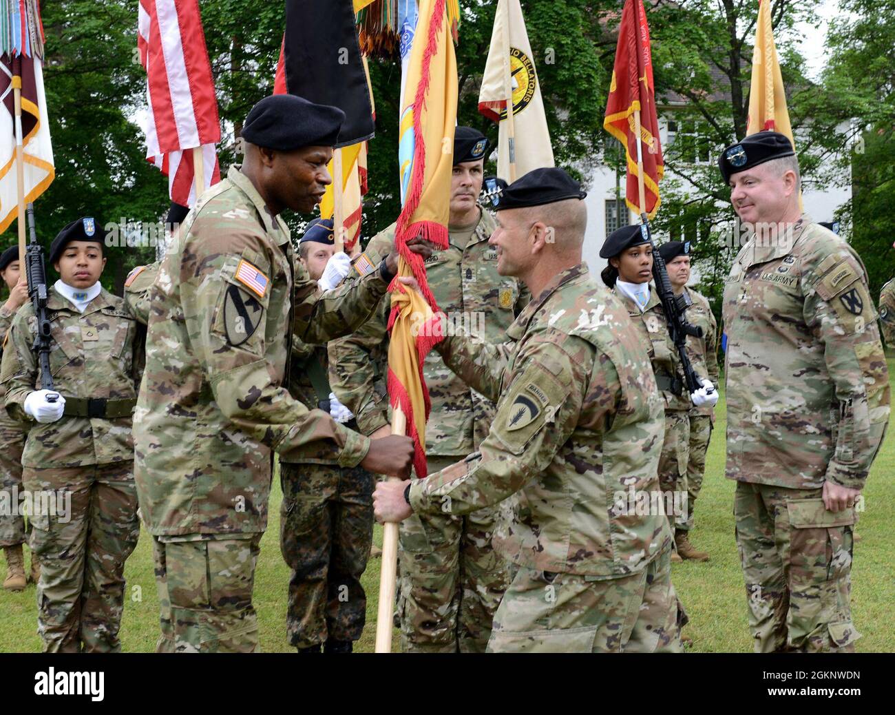 U.S. Army Gen. Christopher G. Cavoli (right), U.S. Army Europe & Africa commander passes the ...