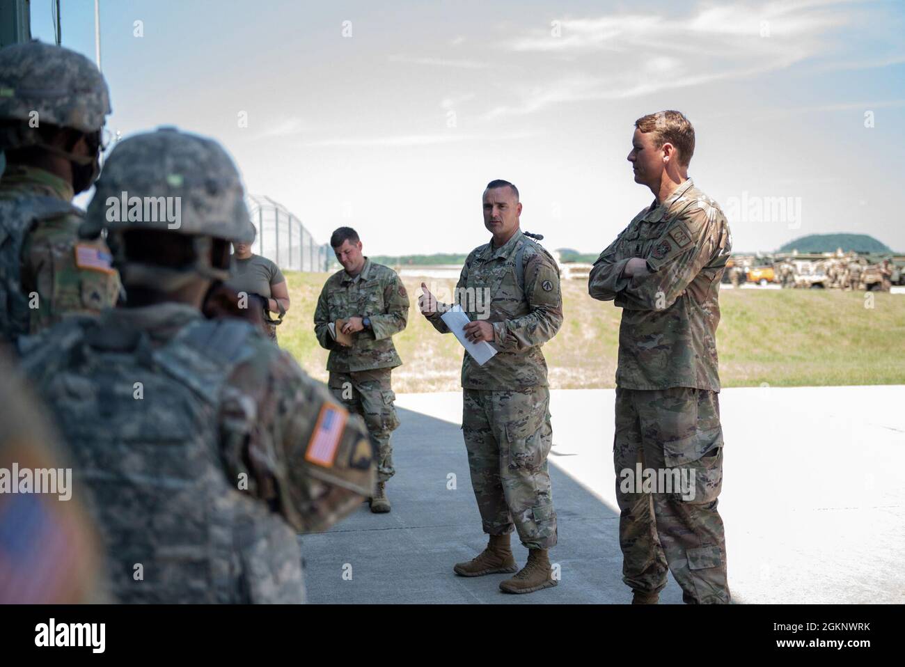 U.S. Army Maj. Christopher Fields (center), commander of the 690th ...