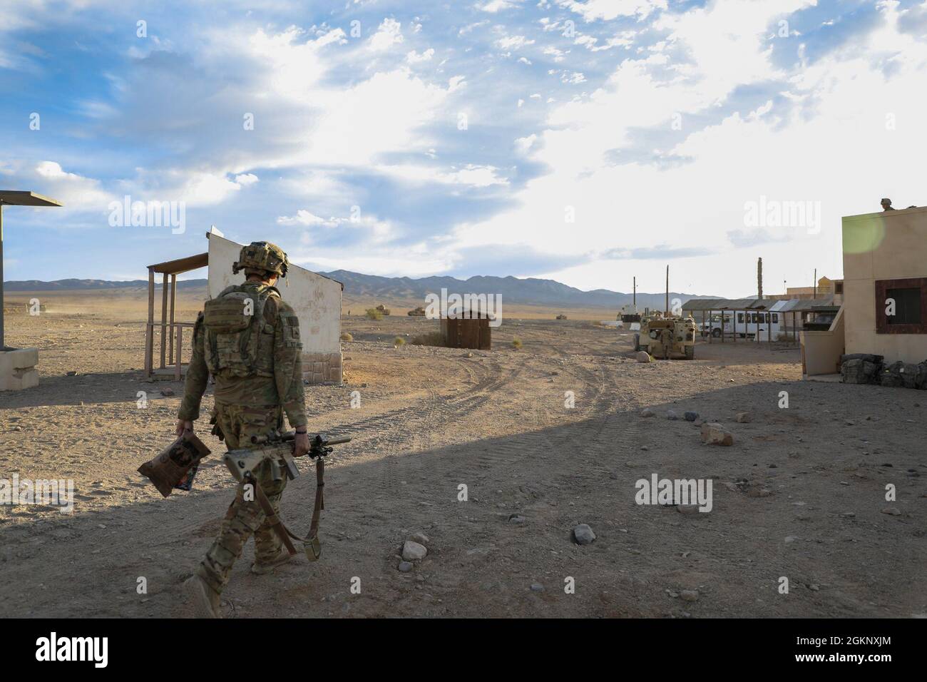 Sgt. James Stuart, a sniper, with the 1st Battalion, 155th Infantry ...