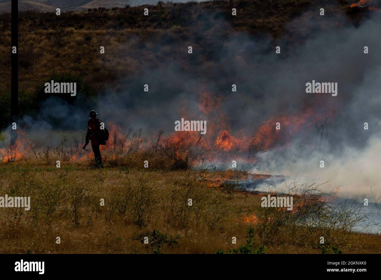 A Camp Pendleton firefighter responds to the Sierra Fire on Marine ...