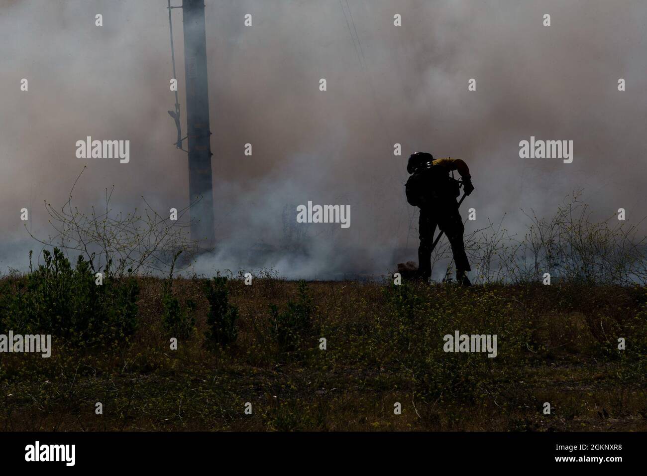 A Camp Pendleton firefighter responds to the Sierra Fire on Marine ...