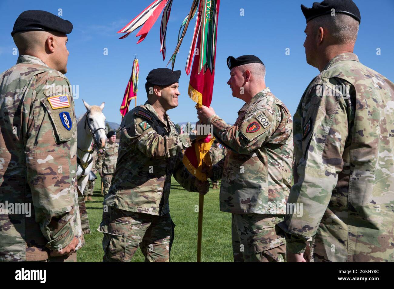 Command Sgt. Maj. David John Silva, 71st EOD Group, passes the group's ...
