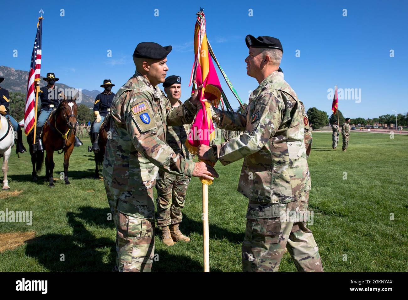 Incoming commander Col. Michael Schoonover accepts the colors from Brig ...