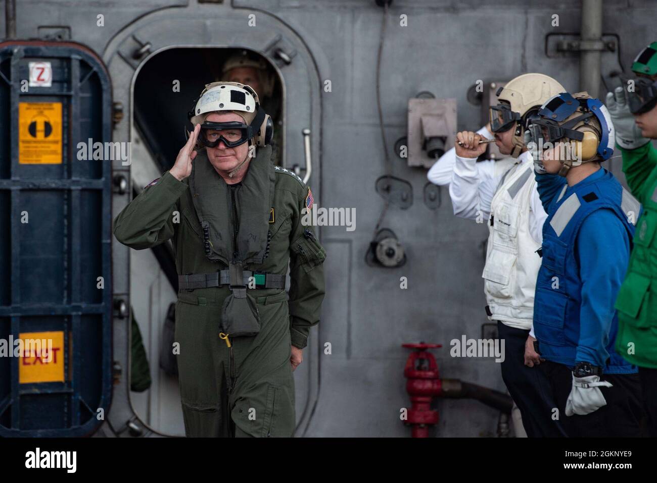 210609-N-ML137-2016 PHILIPPINE SEA (June 9, 2021) Sailors render honors ...