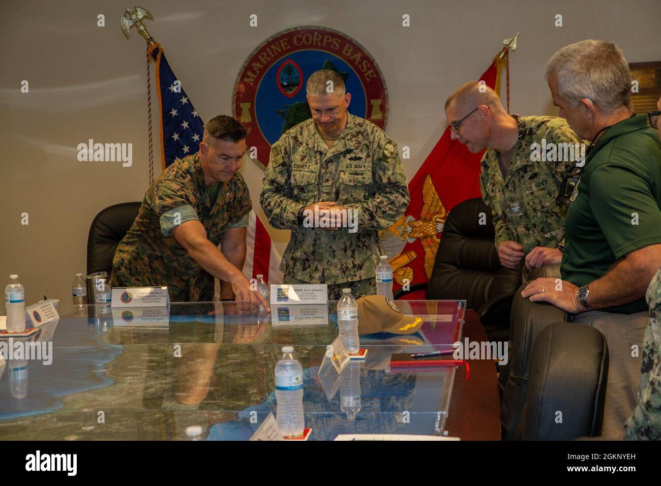 Lt. Col. Tate Buntz, the Marine Corps Base (MCB) Camp Blaz Operations Officer, left, briefs Rear ...