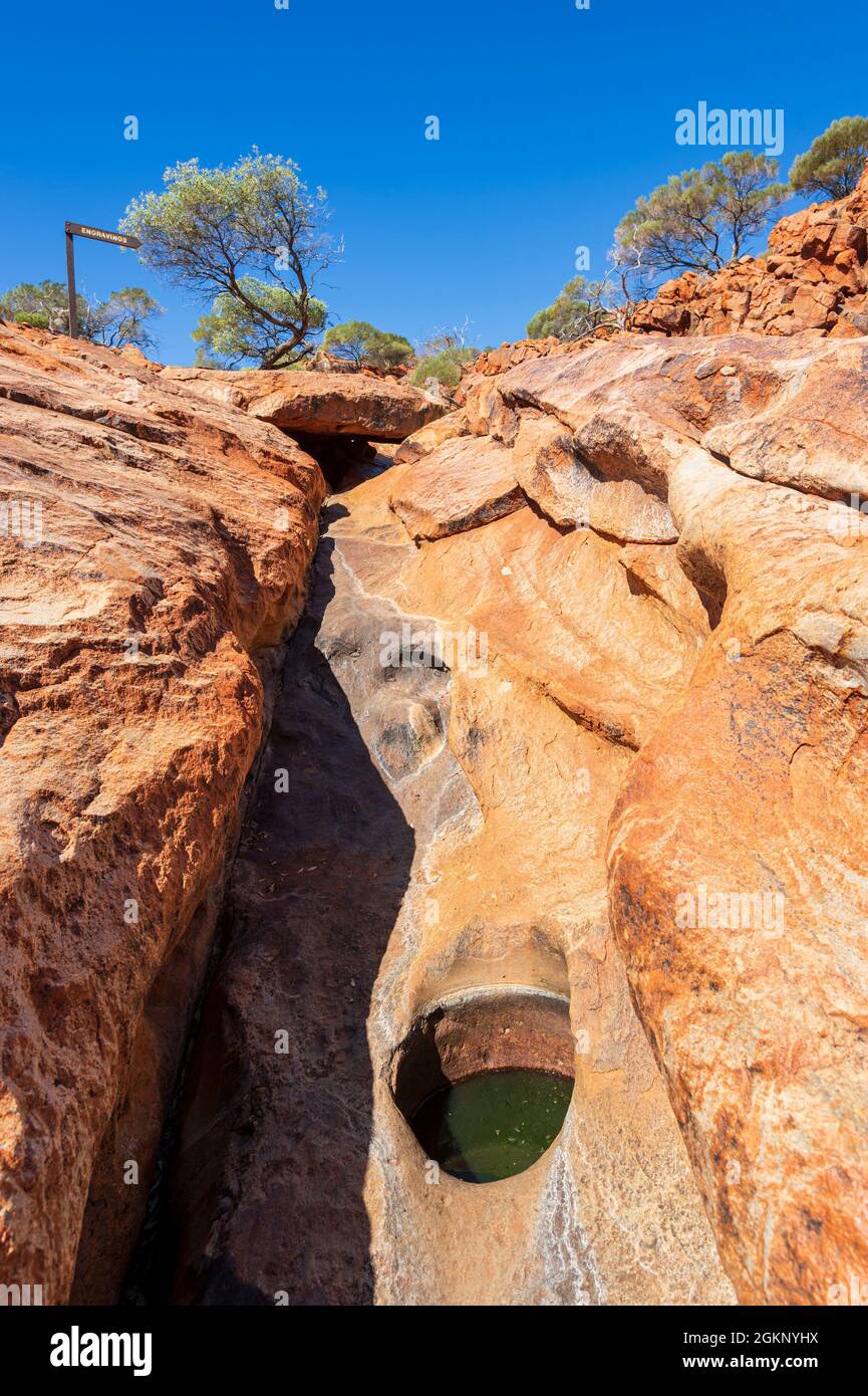 Vertical view of a sandstone gully leading to Aboriginal engravings ...