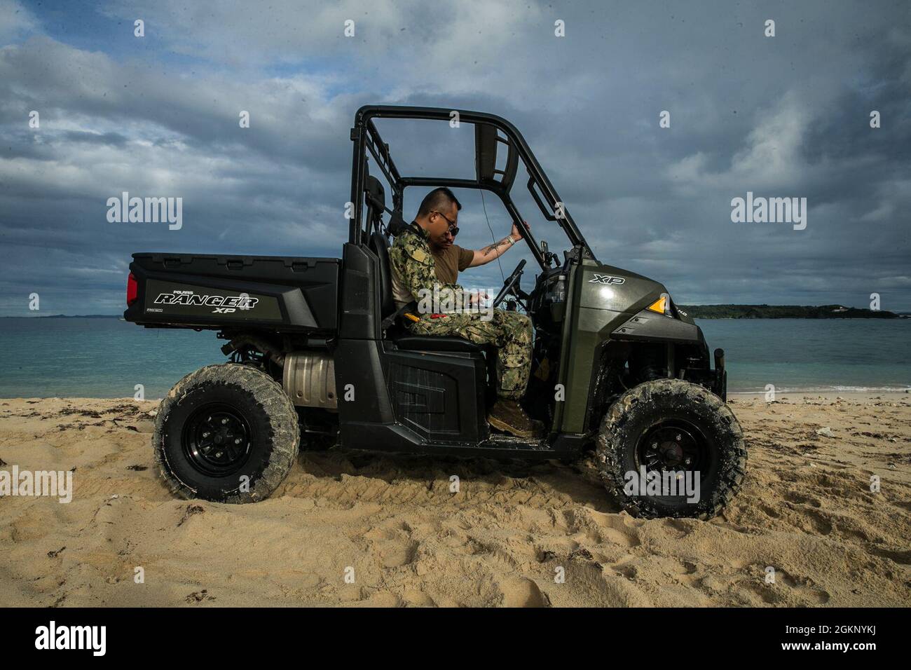 U.S. Navy CE2 Vu Nguyen, a construction electrician with Naval Mobile ...