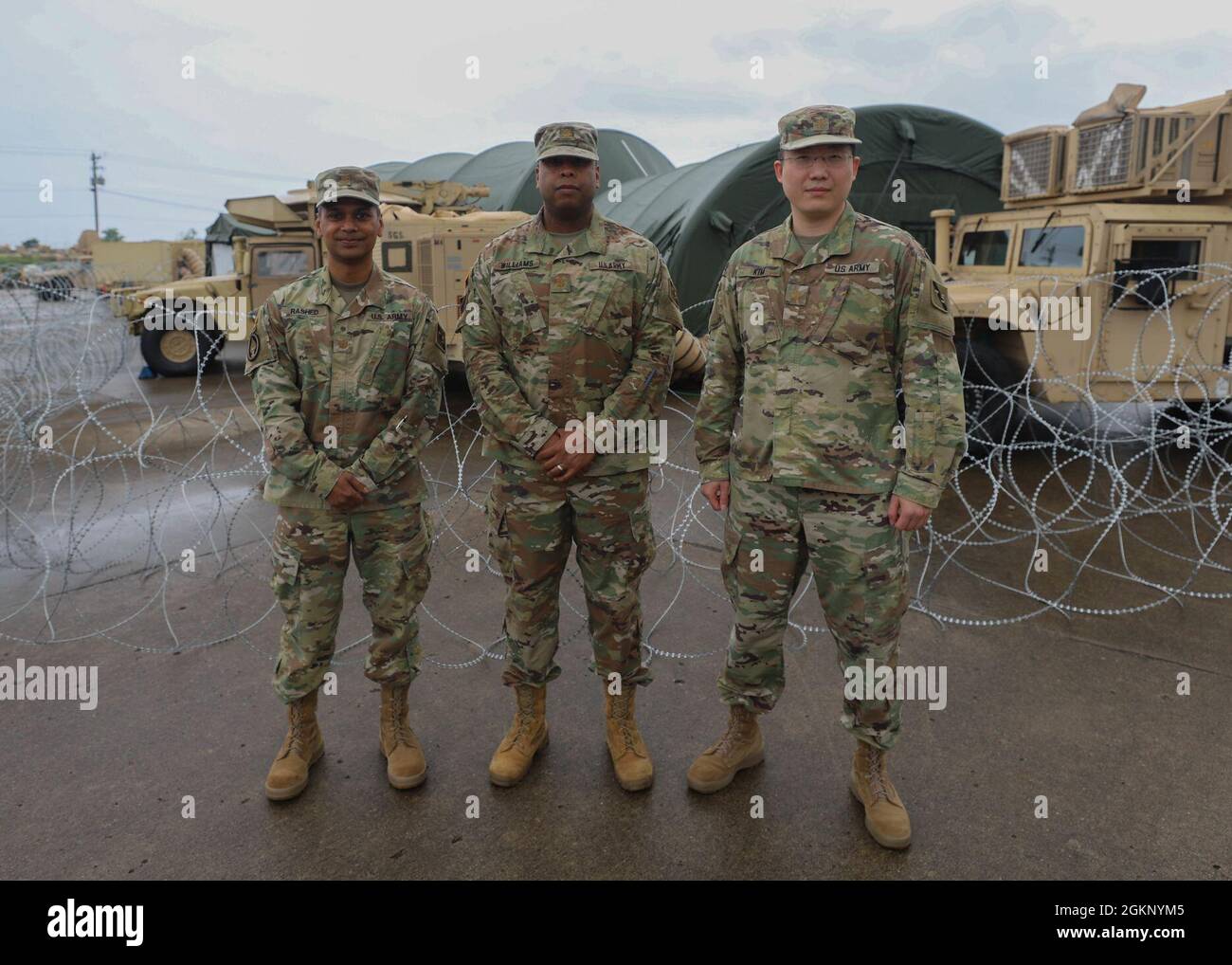 U.S. Army Reserve Soldiers Maj. Mohammed Rashed (left), Maj. Geoffrey ...