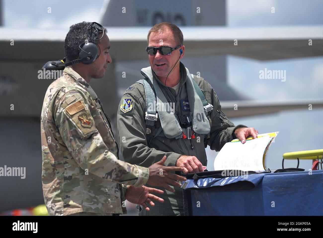 Staff Sgt. Dimitri L. Bush, F-15 crew chief, and Col. Jonathan Mumme ...