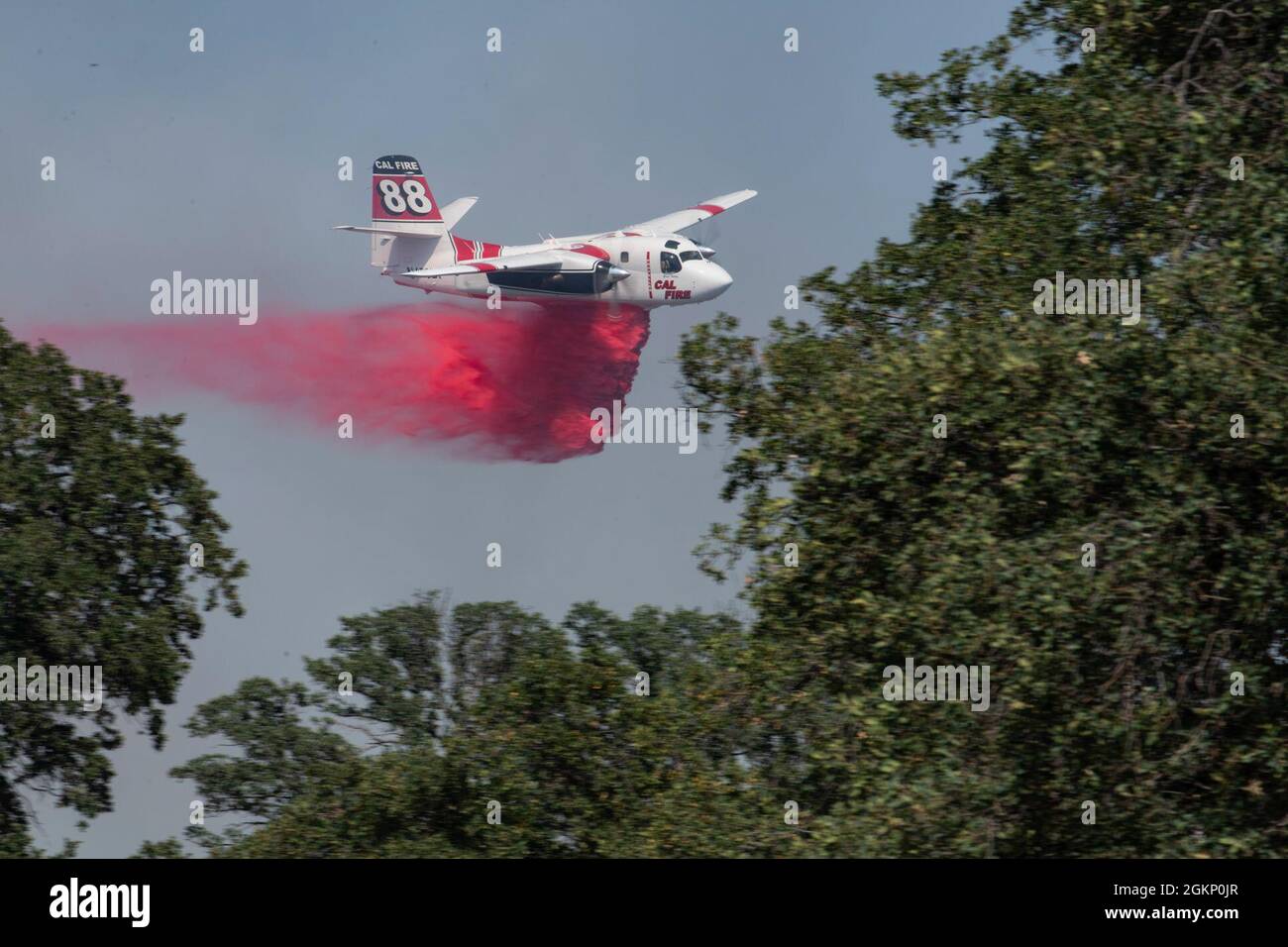 A CalFire S-2T Airtanker drops fire retardant on the Intanko Fire June ...