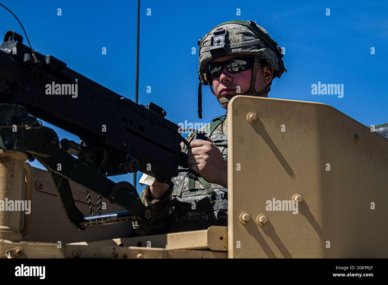 Spc. Kevin Dempsey, a horizontal construction engineer with the 702nd ...