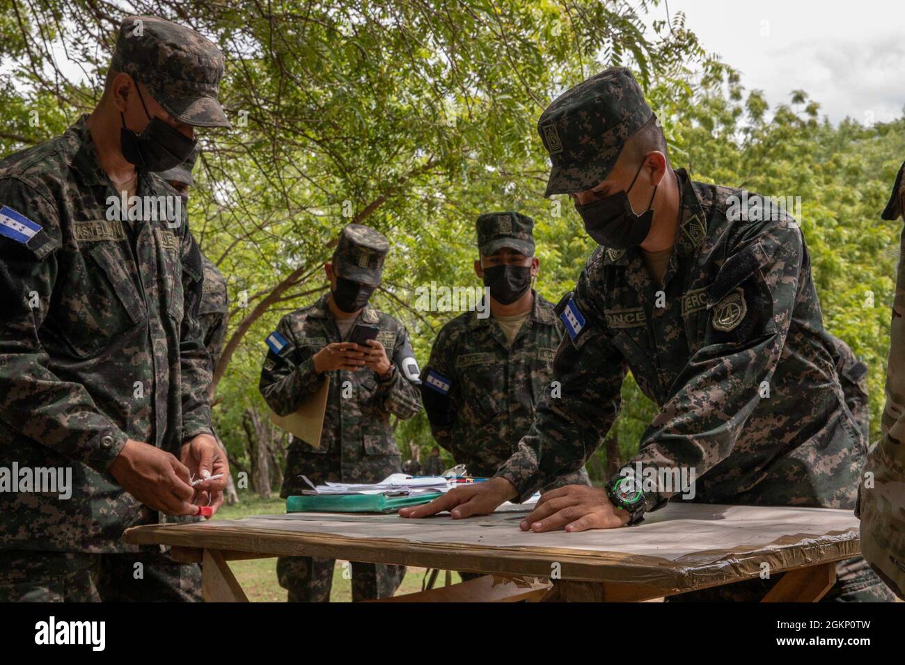 Soldiers assigned to Field Artillery Advisor Team 1412, 5th Battalion ...