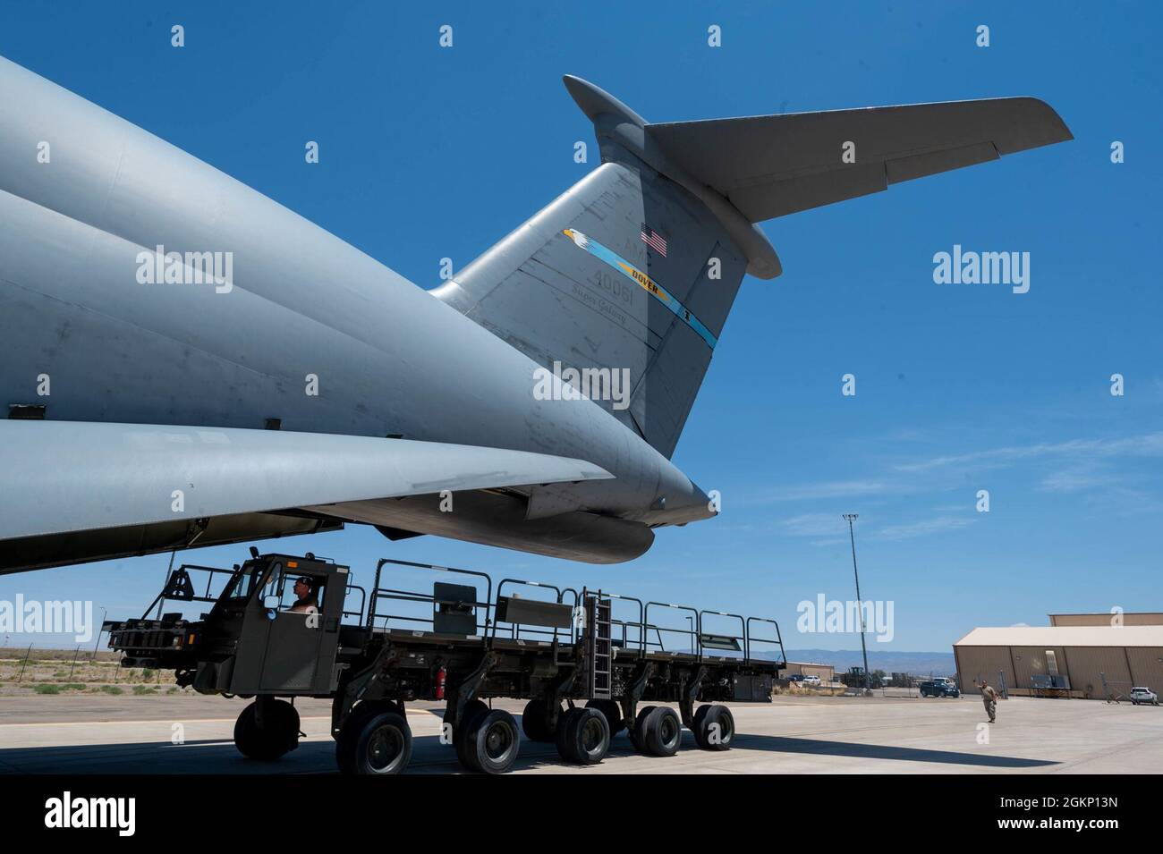 A K-loader is loaded onto a Dover Air Force Base C-5M Super Galaxy ...