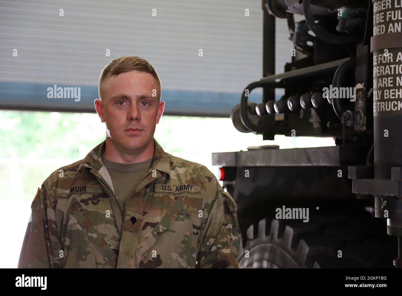 U.S. Army Spc. Joseph G. Muir Jr., a wheeled vehicle mechanic at V ...
