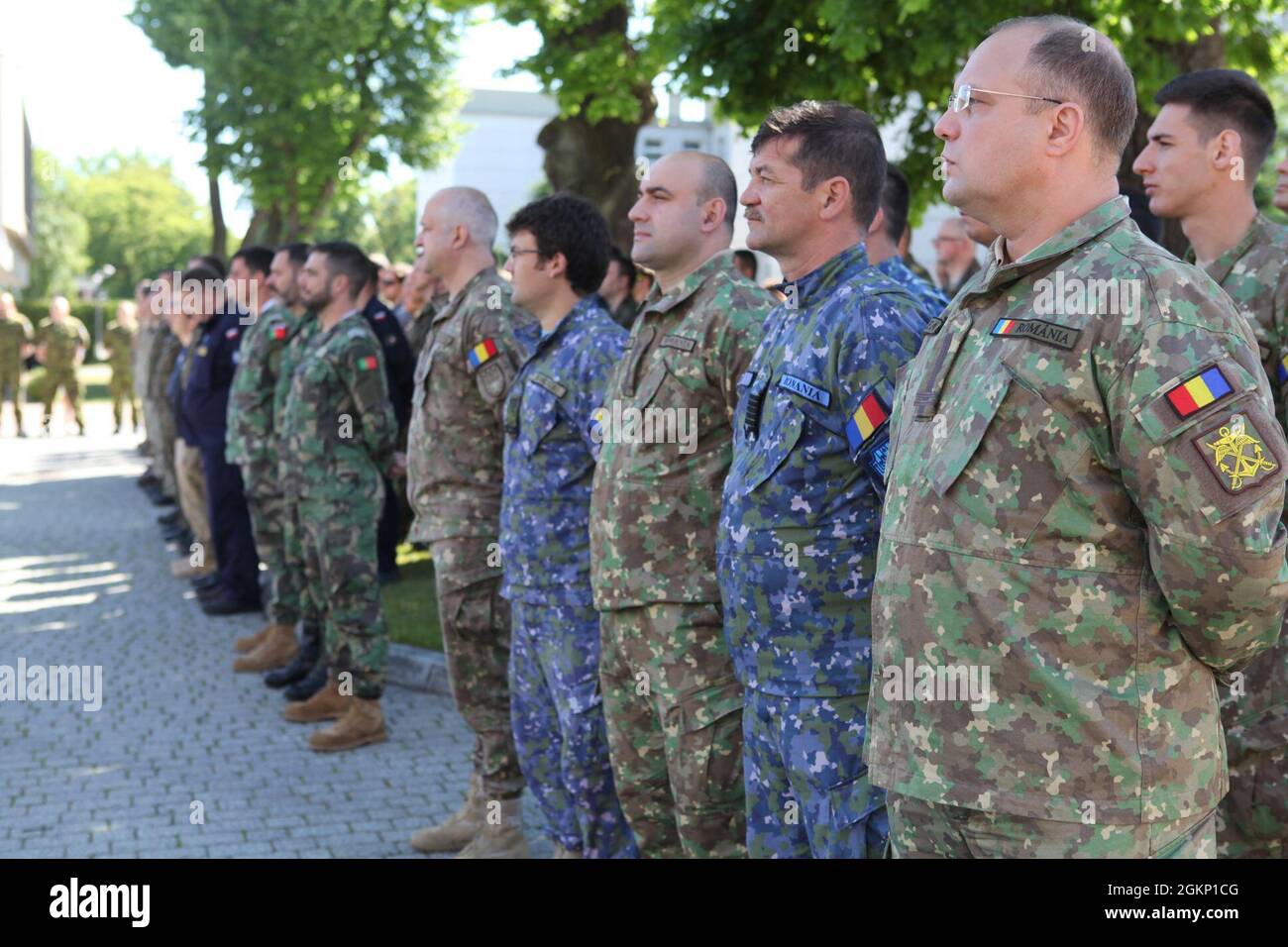 NATO participants stand in formation during the opening day ceremony of ...