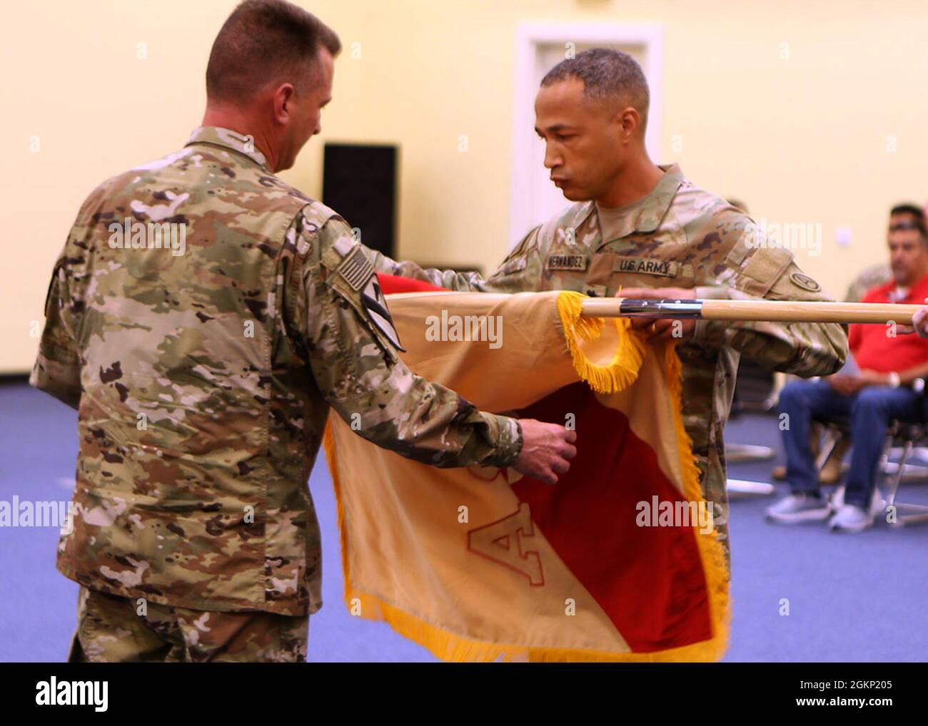 Command Sgt. Maj. Jose Hernandez (right) straightens out the Area ...