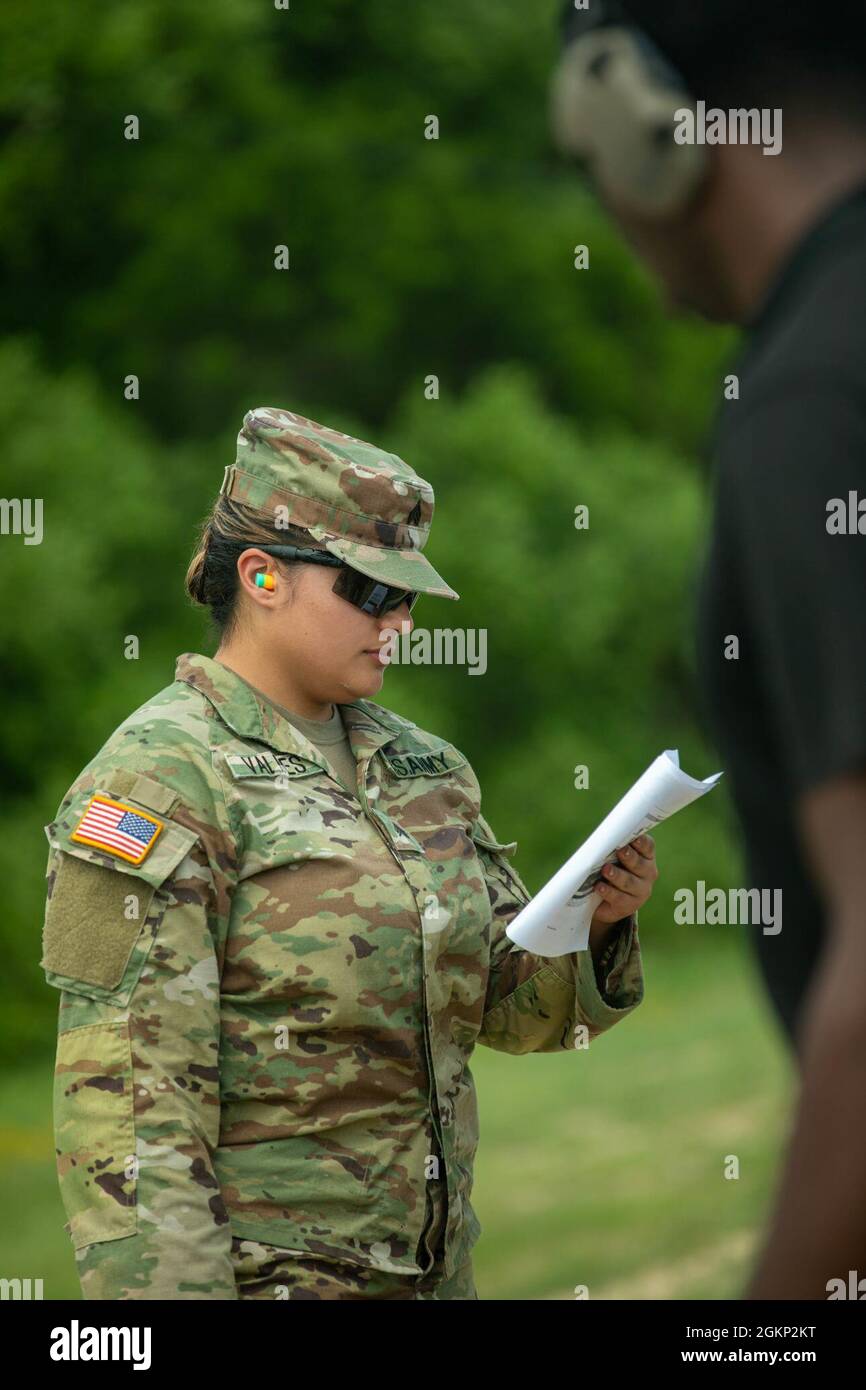 Sgt. Alejandra Valdes, assigned to U.S. Army North, provides guidance ...