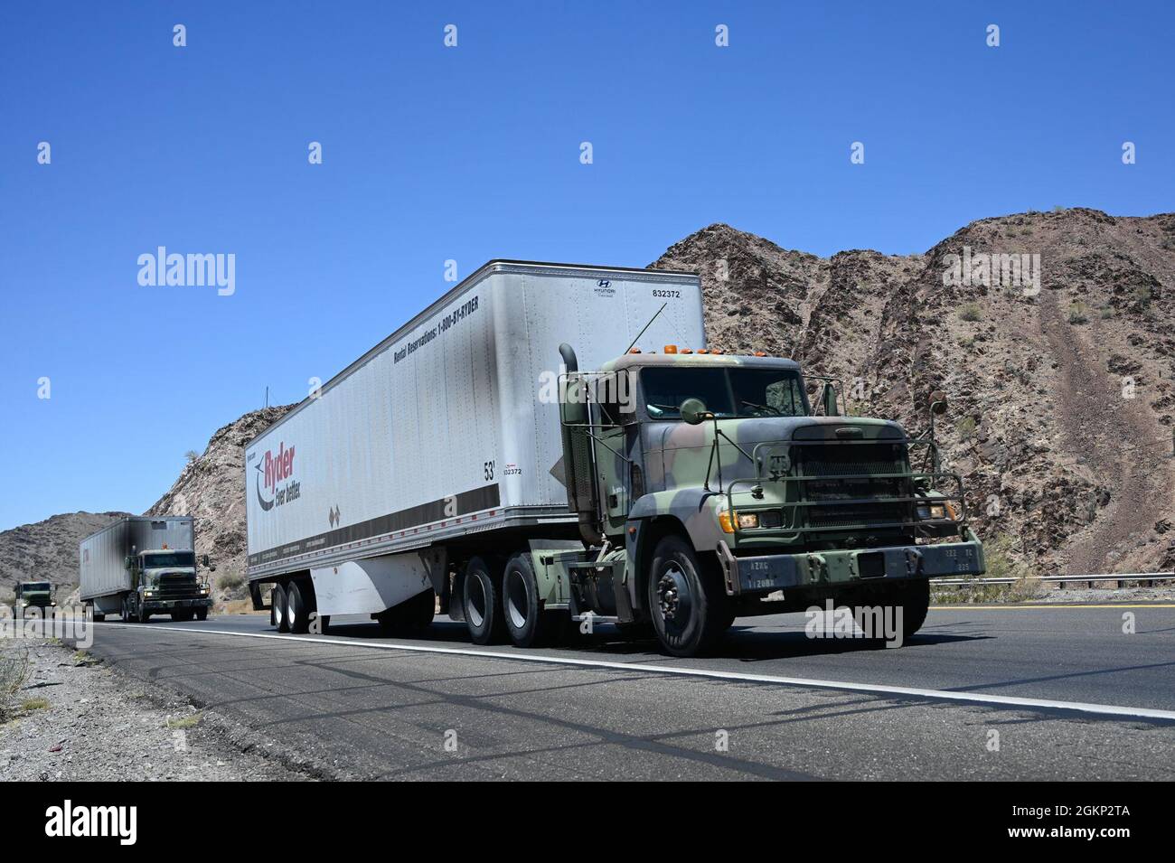 Arizona National Guard service members drive an M915 Line-Haul Tractor ...