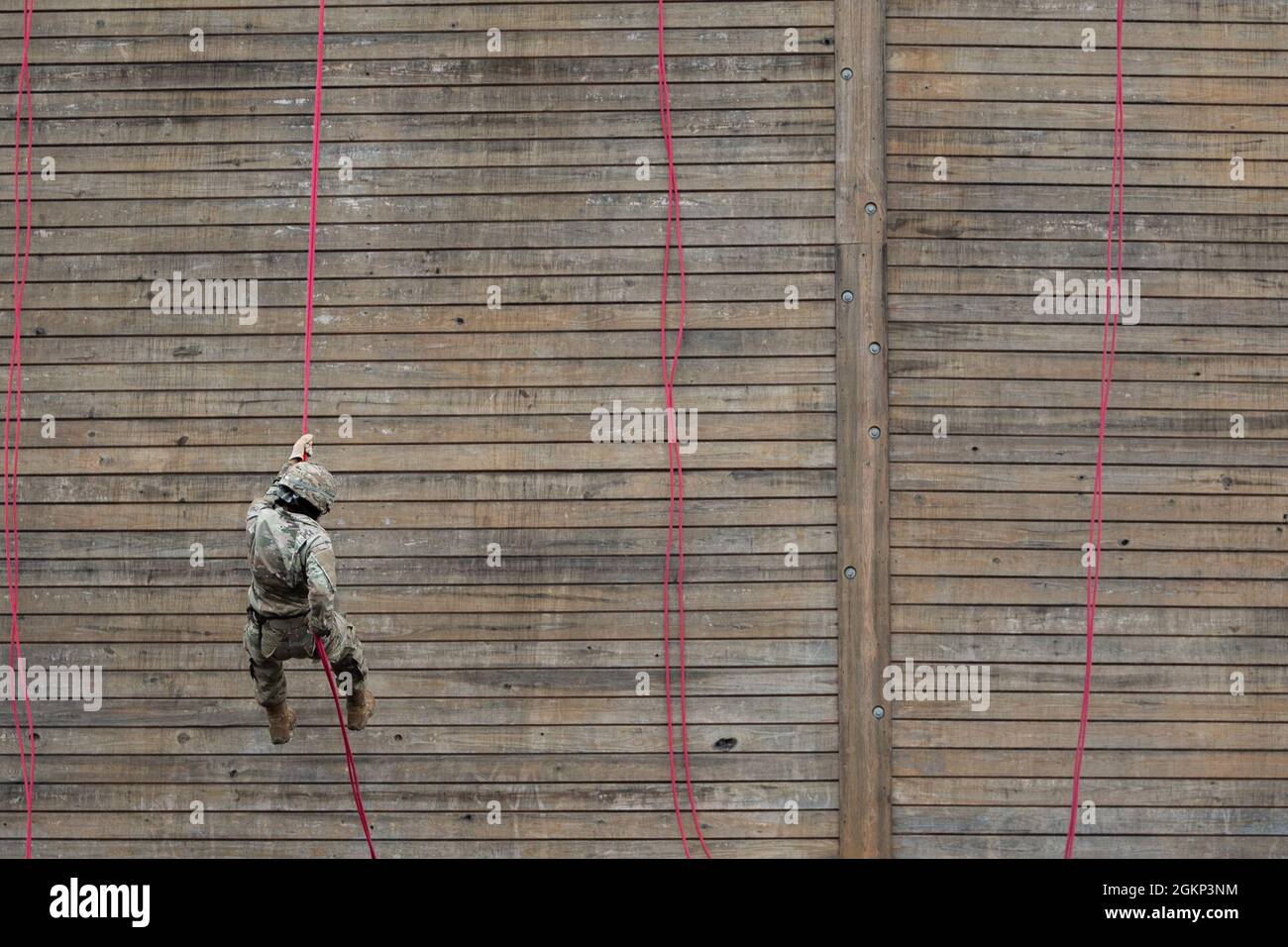 A Cadet rappels off the 64-foot rappel tower during Cadet Summer ...