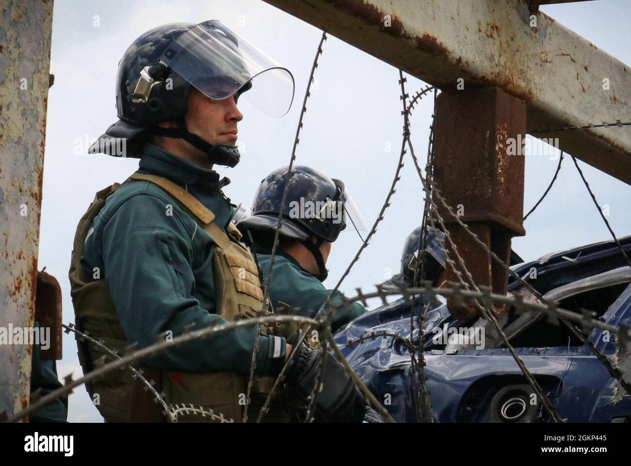 A Slovenian Armed Forces soldier waits behind a barrier during ...