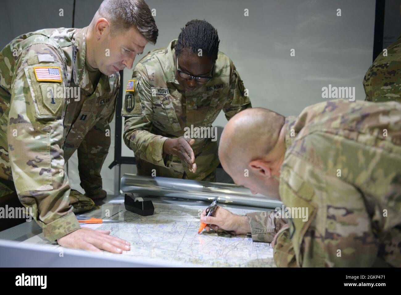 Indiana National Guard Capt. Preston Ray, of Columbus, Maj. Amy Hoover ...
